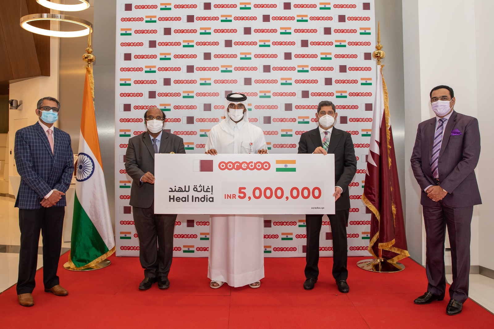 Financial Donation Handed Over to Indian Embassy in Doha - Ooredoo Qatar